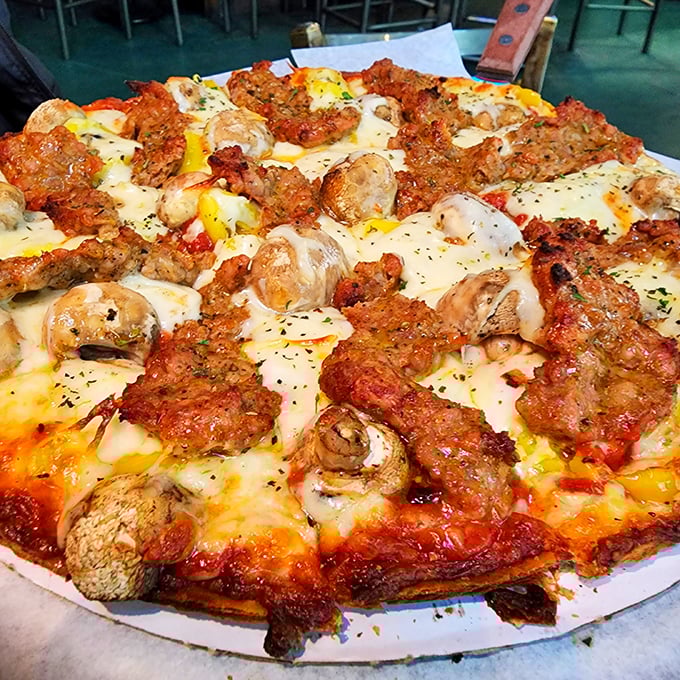 When Italian sausage meets mushrooms, magic happens. This pizza doesn't need fancy words – it lets those golden-brown edges do all the talking.
