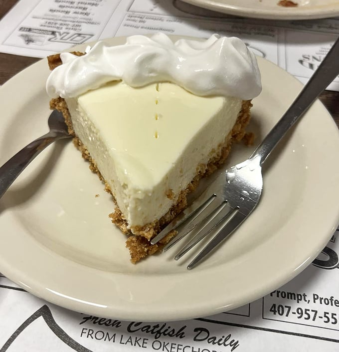 Key lime pie so authentic it should come with a tiny passport—the perfect balance of sweet, tart, and creamy that makes Florida's signature dessert legendary.