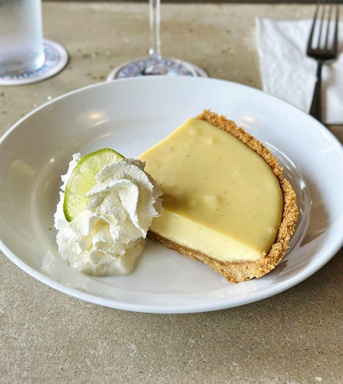 Key lime pie that strikes the perfect balance between tart and sweet, like a culinary tightrope walker who never falls.
