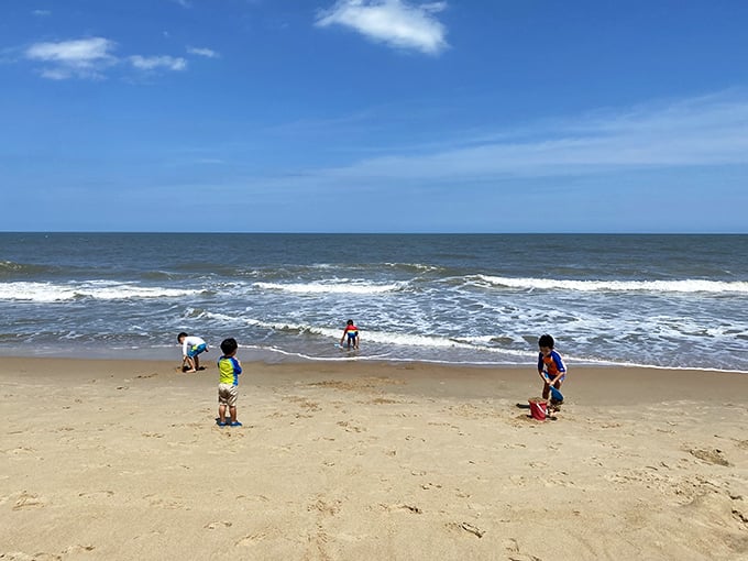 Where childhood memories are made one sandcastle at a time. These kids haven't discovered smartphone addiction yet—there's hope for humanity.