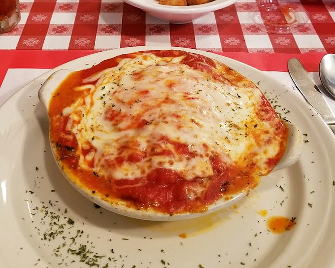Bubbling cheese, rich tomato sauce, and that perfectly browned edge—this lasagna isn't just a meal, it's a warm Italian hug on a plate.