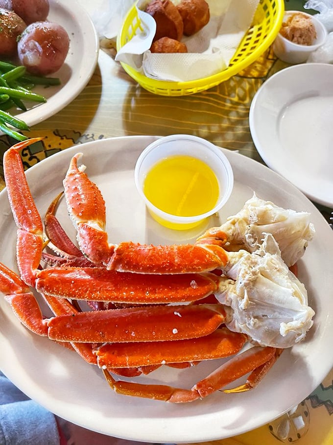 Snow crab legs that require both commitment and drawn butter – the kind of meal where rolling up your sleeves is not optional.