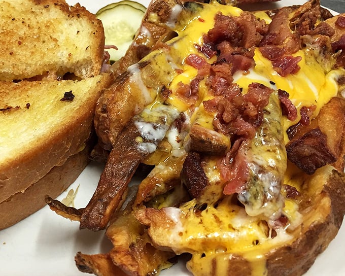 A loaded omelet that doesn't just break the fast—it demolishes it with cheesy, bacon-topped authority.