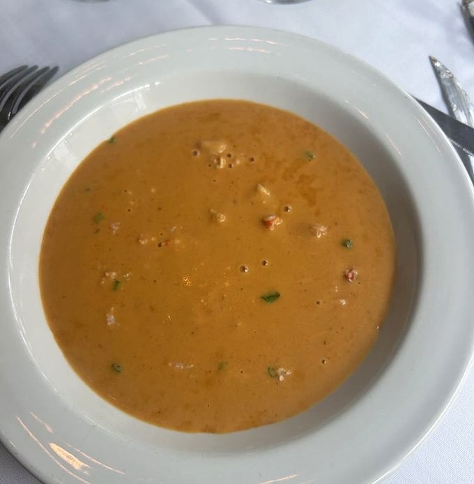 A lobster bisque that whispers sweet nothings to your taste buds. Each spoonful is like a warm hug from the ocean.