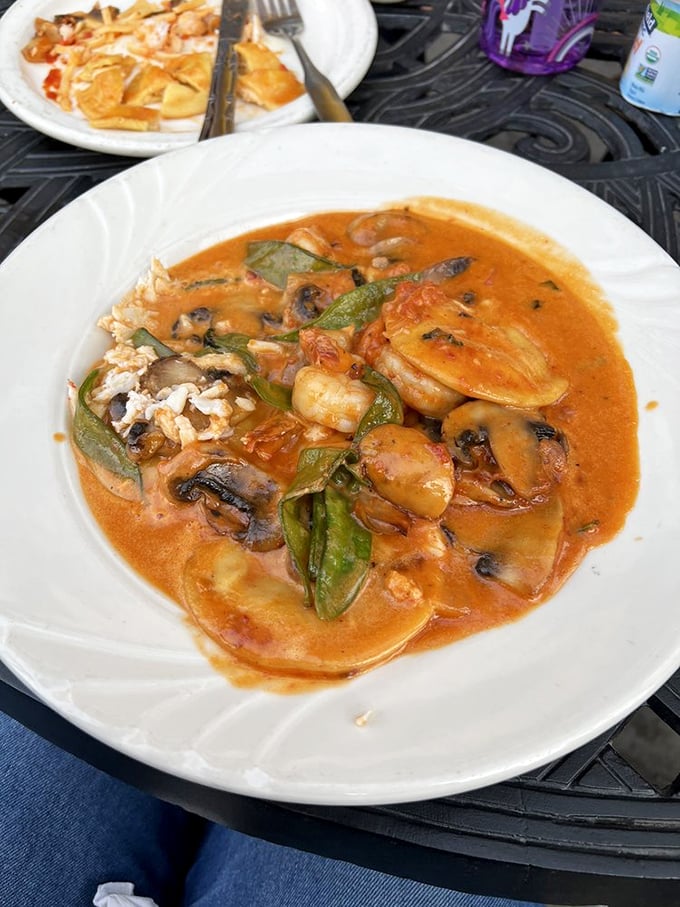 Lobster ravioli swimming in rich tomato sauce – when pasta meets luxury, magic happens on your plate.