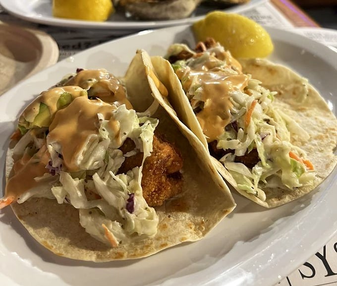 Fish tacos that don't need a passport to deliver authentic flavor—just fresh mahi, crunchy slaw, and that sauce!