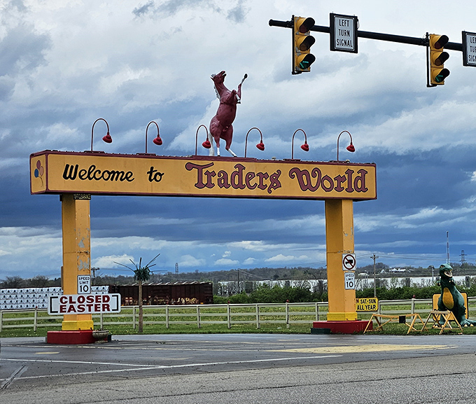 The entrance arch with its jaunty red bull statue serves as a quirky landmark that says, "Normal shopping rules don't apply here—and that's the fun of it."