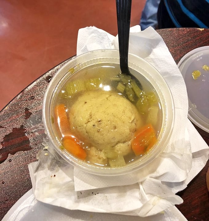 Matzo ball soup: Jewish penicillin in its most delicious form. A golden broth cradling a fluffy matzo ball that grandmothers everywhere would approve of.