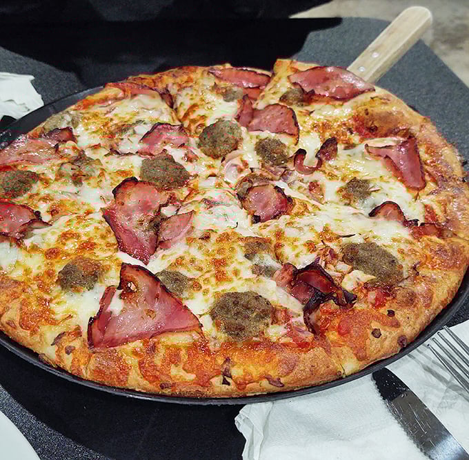 This isn't just a pizza—it's a meaty masterpiece where pepperoni and sausage throw the party of the year on a perfectly baked crust.