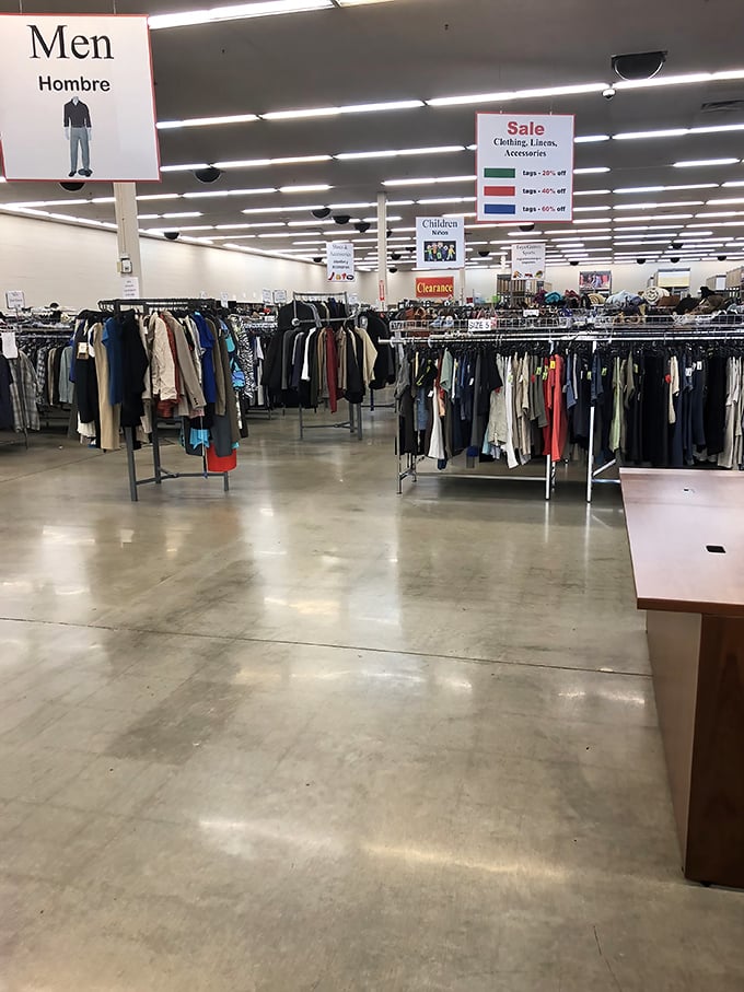 Men's clothing organized with military precision—proof that looking like a million bucks and spending like a penny-pincher aren't mutually exclusive. 