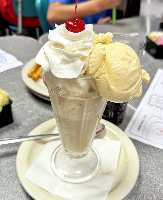 This isn't just a milkshake—it's a tower of dairy magnificence that requires both a straw and a moment of silent appreciation.