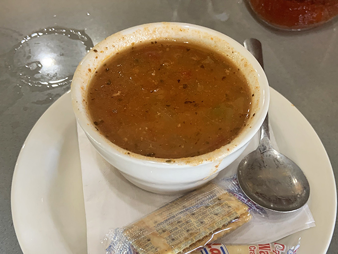 Minorcan clam chowder—Florida's spicier, more interesting cousin to New England's version. Like comparing Jimmy Buffett to Mozart—both brilliant, just different vibes.