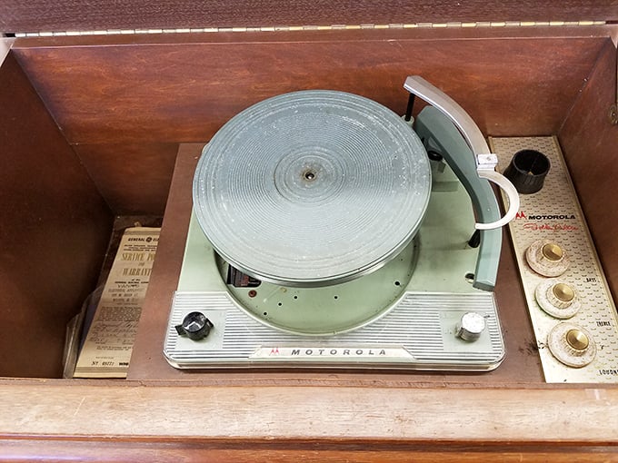 This vintage Motorola record player isn't just a music device—it's a time machine. Imagine the cocktail parties and sock hops this golden voice once serenaded.