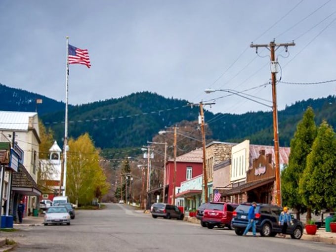 Main Street on a perfect day – where the mountains watch over shoppers and the American flag stands prouder than anywhere else.