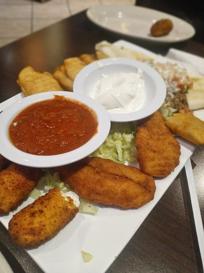 Golden-fried mozzarella sticks and crispy appetizers served with vibrant salsa – the opening act that threatens to steal the show.