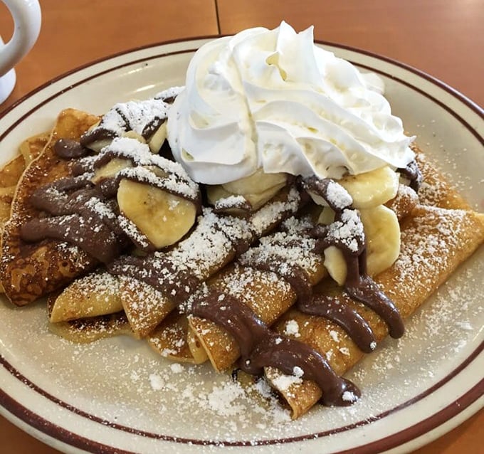 Dessert masquerading as breakfast—and nobody's complaining! These Nutella banana crepes with their mountain of whipped cream make "most important meal" sound like an understatement. 