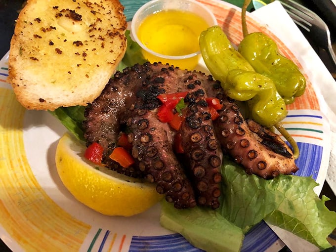 Grilled octopus that would make any Mediterranean grandmother nod with approval – tender, charred, and absolutely divine.