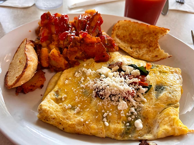 This Greek-inspired omelet doesn't just feed your hunger—it tells a story of perfect technique, with feta cheese melting into every fluffy fold.