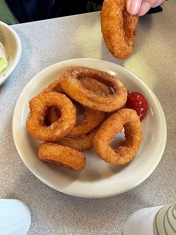 These onion rings aren't just side dishes—they're golden halos of perfectly fried, crispy-sweet onion that deserve their own special place in the comfort food hall of fame.