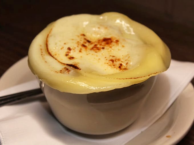 This isn't just an onion soup—it's a warm, cheesy hug in a bowl that's worth every inevitable shirt stain.