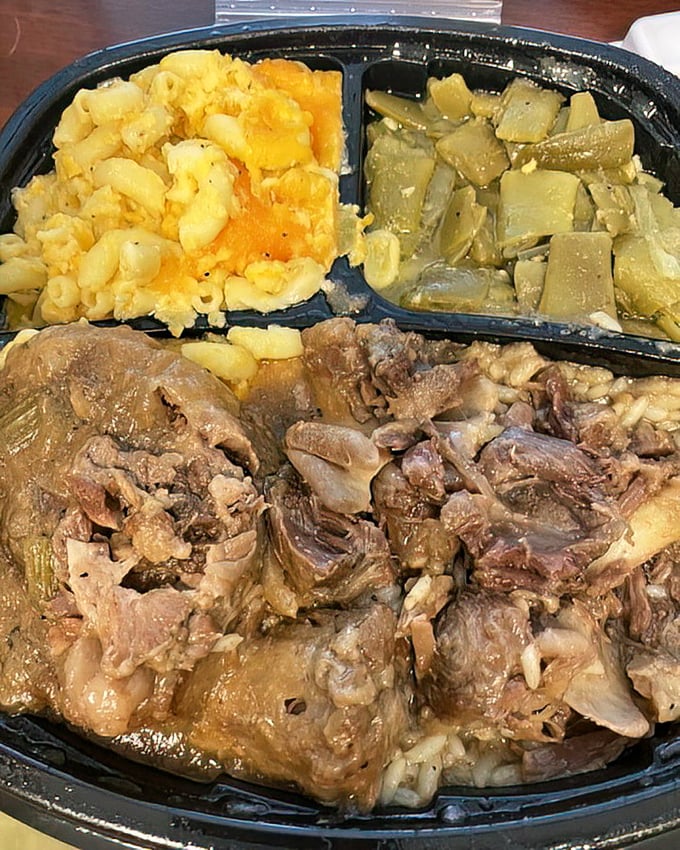 Oxtail dinner with mac and cheese and greens – the holy trinity of soul food that makes you want to hug the chef.