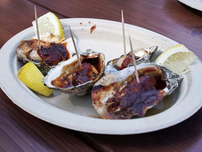 BBQ oysters with lemon wedges – because sometimes the ocean and the smoker need to have a conversation. A delicious, unexpected dialogue.