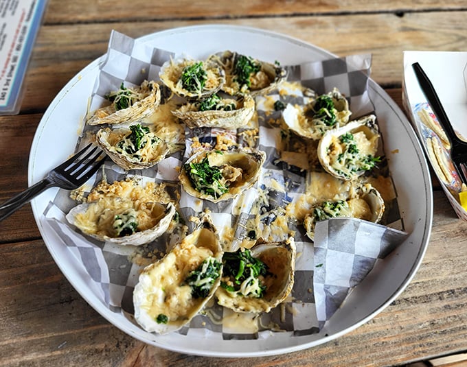 Oysters Rockefeller—where spinach suddenly becomes everyone's favorite vegetable when paired with briny shells and melted cheese.