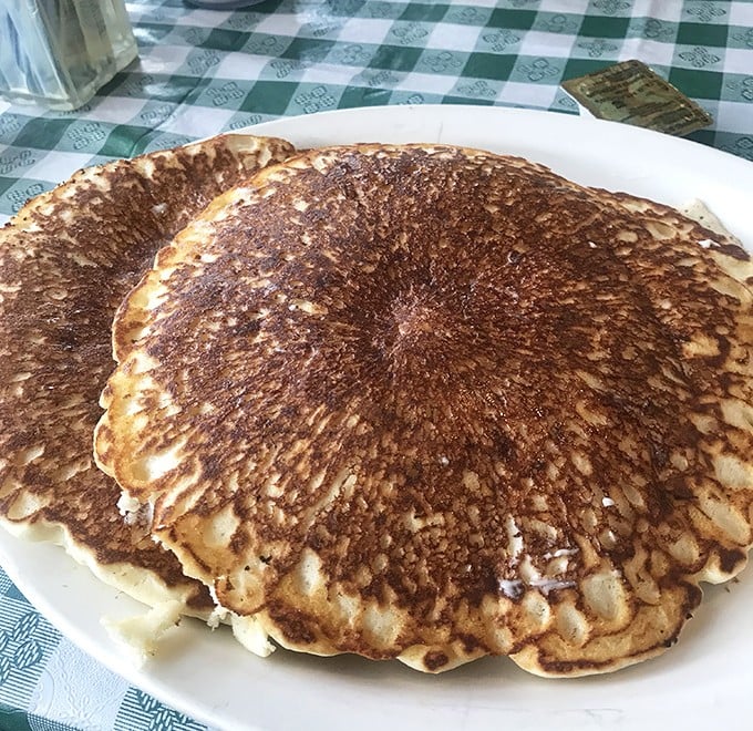 Pancakes so perfectly golden they deserve their own Instagram account—the size of hubcaps, the texture of clouds.
