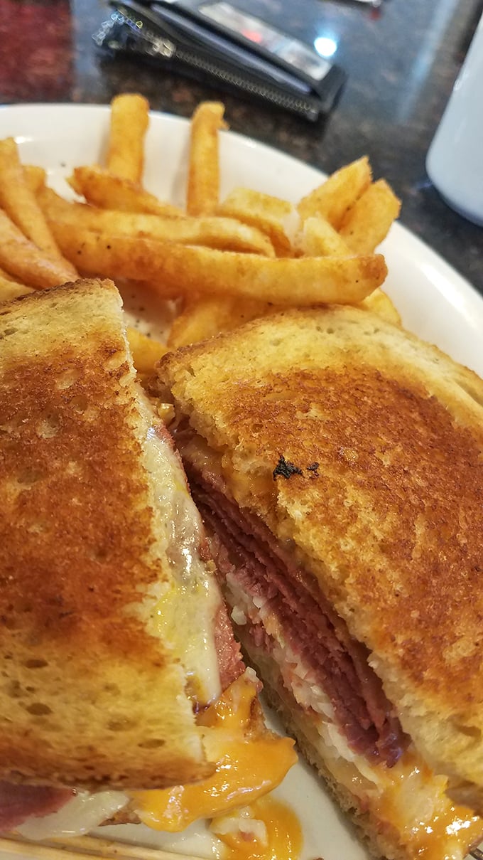 The grilled cheese sandwich that haunts your dreams – perfectly golden with that cheese pull that deserves its own Instagram account.