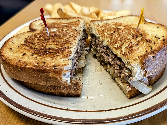 The patty melt – that perfect marriage of beef, bread and cheese – executed with the kind of precision that makes you wonder why you'd ever order anything else.
