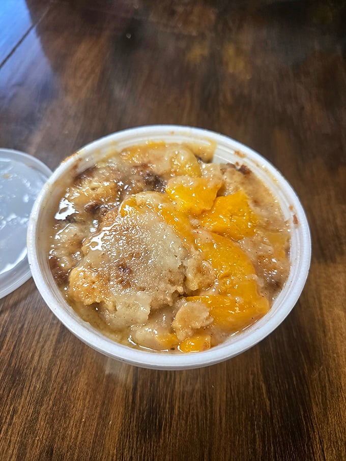 Peach cobbler that captures summer in a cup. The fruit and buttery crust perform a delicious duet that makes you close your eyes with each bite.