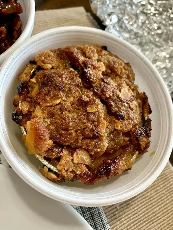 Not all heroes wear capes—some come in containers with golden crusts. This peach cobbler has ended more arguments than couples therapy.