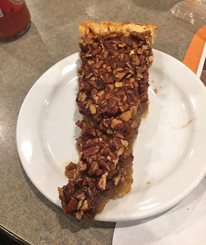 Pecan pie so perfect it could make a grown Southerner weep. The ratio of gooey filling to crunchy pecans represents mathematical perfection.