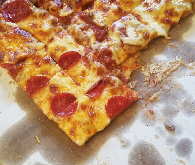 Pepperoni pizza perfection – where each slice achieves that magical balance between crispy, chewy, saucy, and cheesy that pizza dreams are made of.