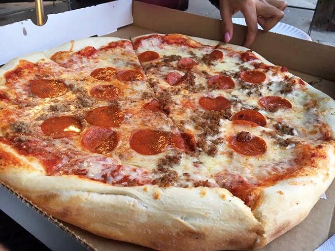 This pepperoni and sausage pizza doesn't need a fancy wood-fired oven or imported ingredients to achieve greatness—just decades of know-how.