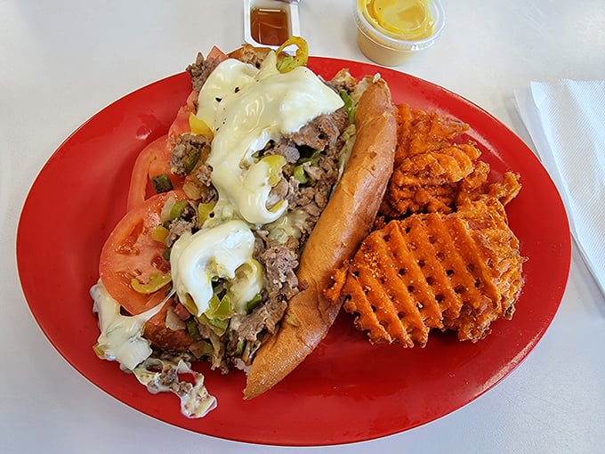 This Philly cheesesteak doesn't need Philadelphia's approval—the melty cheese, tender beef, and fresh veggies create a sandwich symphony that speaks for itself.