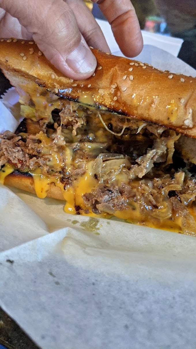 Cheese cascading over thinly sliced beef – this Philly cheesesteak doesn't need a passport to deliver authentic flavor bombs.