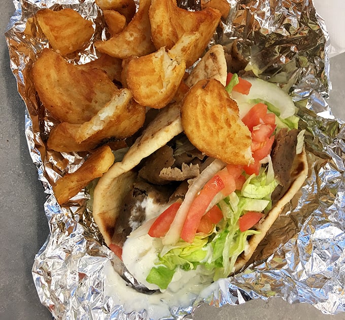 When a gyro meets perfectly golden fries, it's not just lunch—it's a Mediterranean vacation wrapped in foil on High Street.