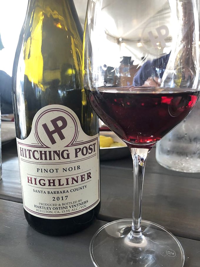 Their Highliner Pinot Noir—liquid poetry in a glass. Ruby-red evidence that this place takes its wine program as seriously as its legendary steaks.