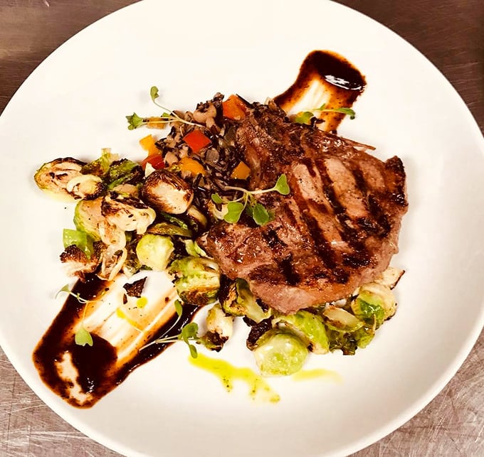 Meat masterpiece alert! This pork chop with charred Brussels sprouts isn't just dinner—it's the reason elastic-waist pants were invented.