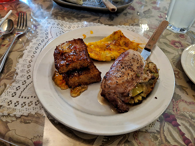 Southern hospitality on a plate – where stuffed chicken, pork tenderloin, and corn pudding come together like the world's most delicious family reunion.