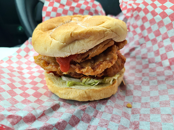 The star of the show: a pork tenderloin sandwich with the ideal meat-to-breading ratio. No plate-sized gimmicks here—just perfect proportions.