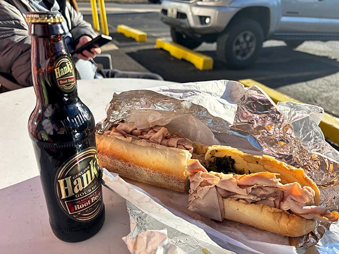 This ham hoagie paired with Hank's Root Beer is the lunch equivalent of finding a parking spot right in front—a small miracle worth celebrating.