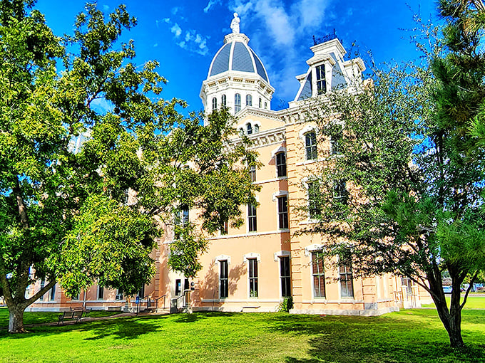 The Presidio County Courthouse stands majestic against the Texas sky, its dome a beacon of Victorian splendor.