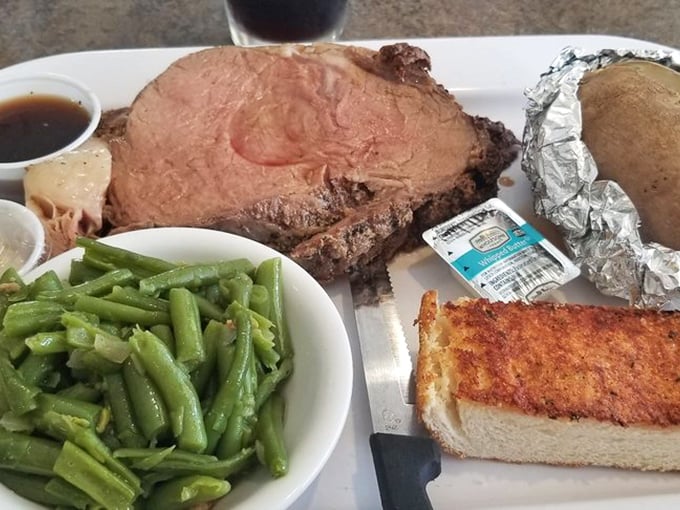 Prime rib that doesn't need a filter or fancy lighting—just a sharp knife and your undivided attention. Green beans for color, not conscience.