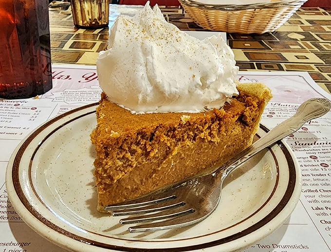 Pumpkin pie so authentic it makes store-bought versions hang their heads in shame. That dollop of whipped cream is the perfect finishing touch.