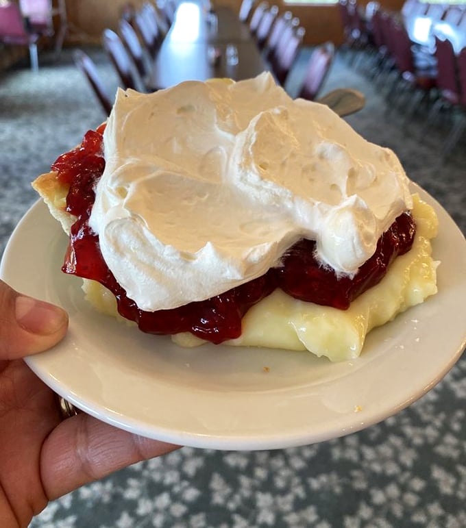 Layer upon heavenly layer—this raspberry cream pie performs the impossible magic trick of being both light as air and deeply satisfying.