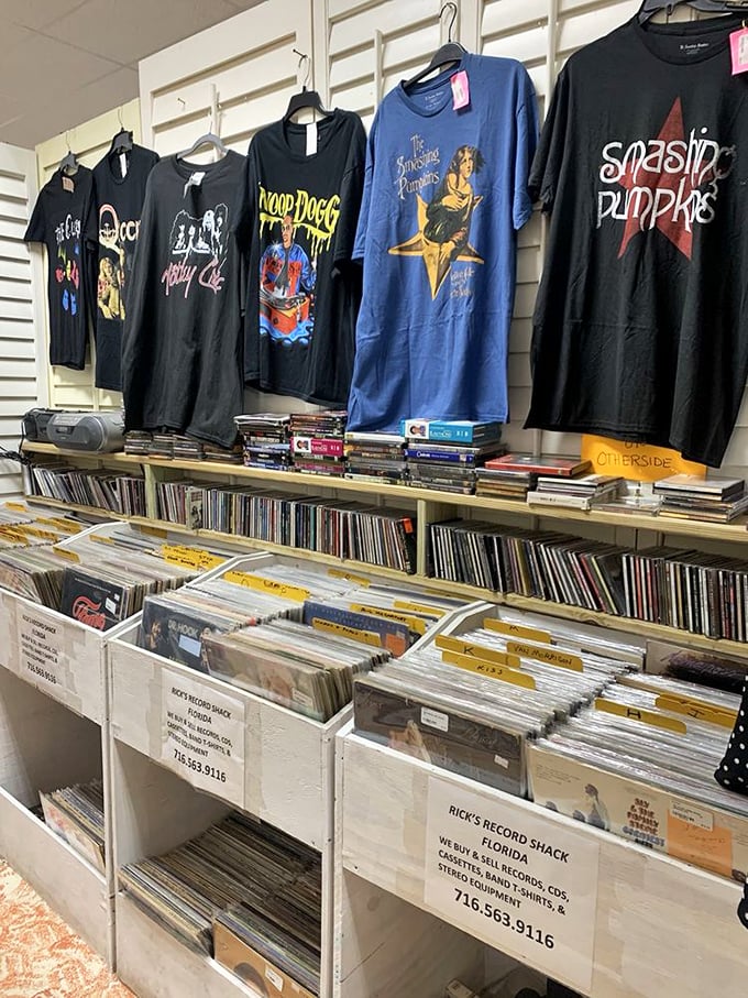 Rock 'n' roll heaven meets vinyl nirvana—where Smashing Pumpkins t-shirts hang above the albums that soundtracked our more rebellious years.