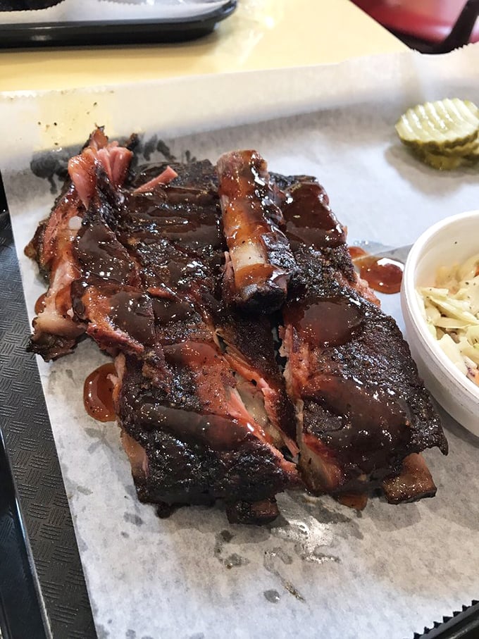 These ribs have the perfect "tug"—not falling off the bone (that's overdone) but yielding with just the right resistance. BBQ poetry in motion. 