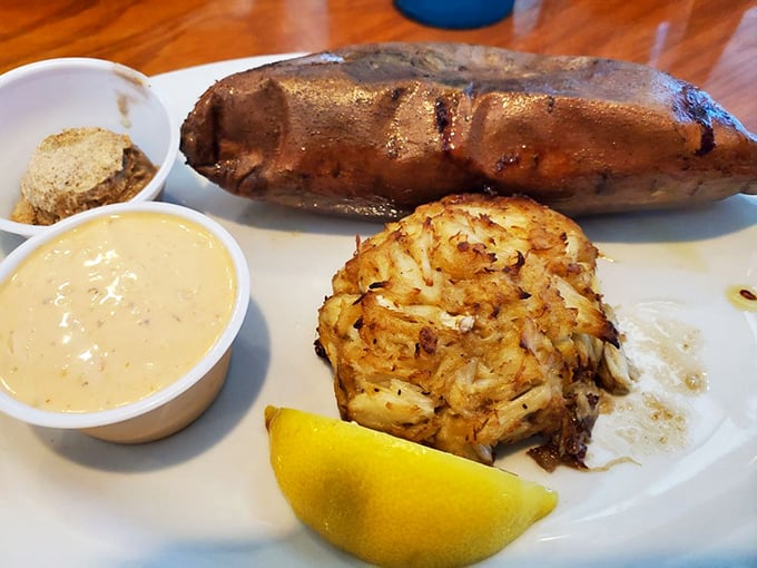 A baked potato that's seen better days meets its perfect match—a seafood spread fit for Neptune himself. Simple pleasures elevated to maritime royalty.